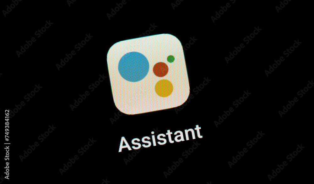 Close-up view of the Google Assistant app logo displayed on a ...