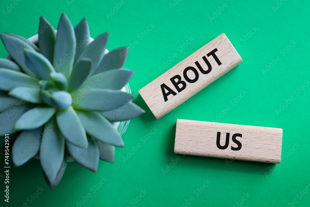 About us symbol. Concept word About us on wooden blocks. Beautiful ...
