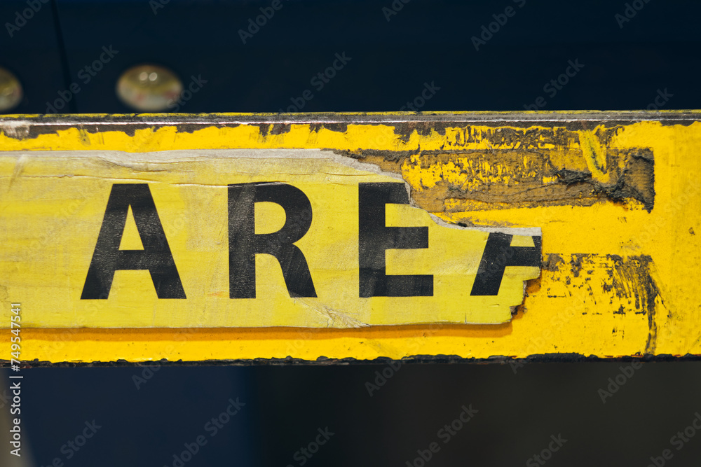A yellow vibrant eye catching pallet area loading bay sign. Storing ...