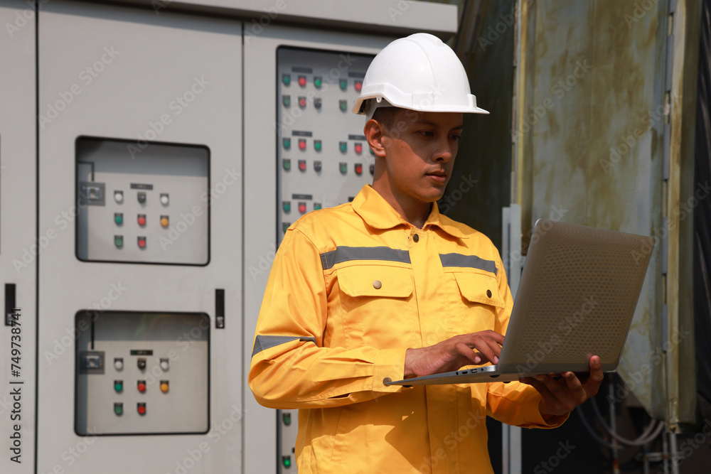 The electrical engineer checks and inspects at MDB panel (Main ...