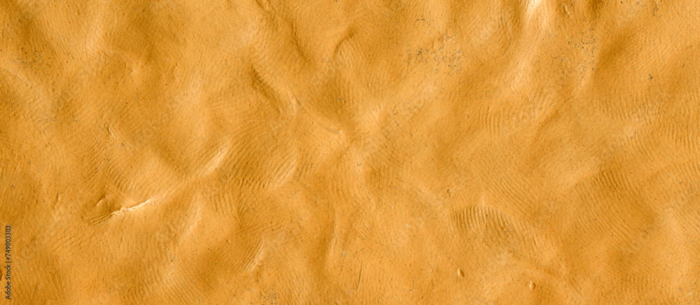 Orange colored plasticine texture. Ochre playdough textured background ...