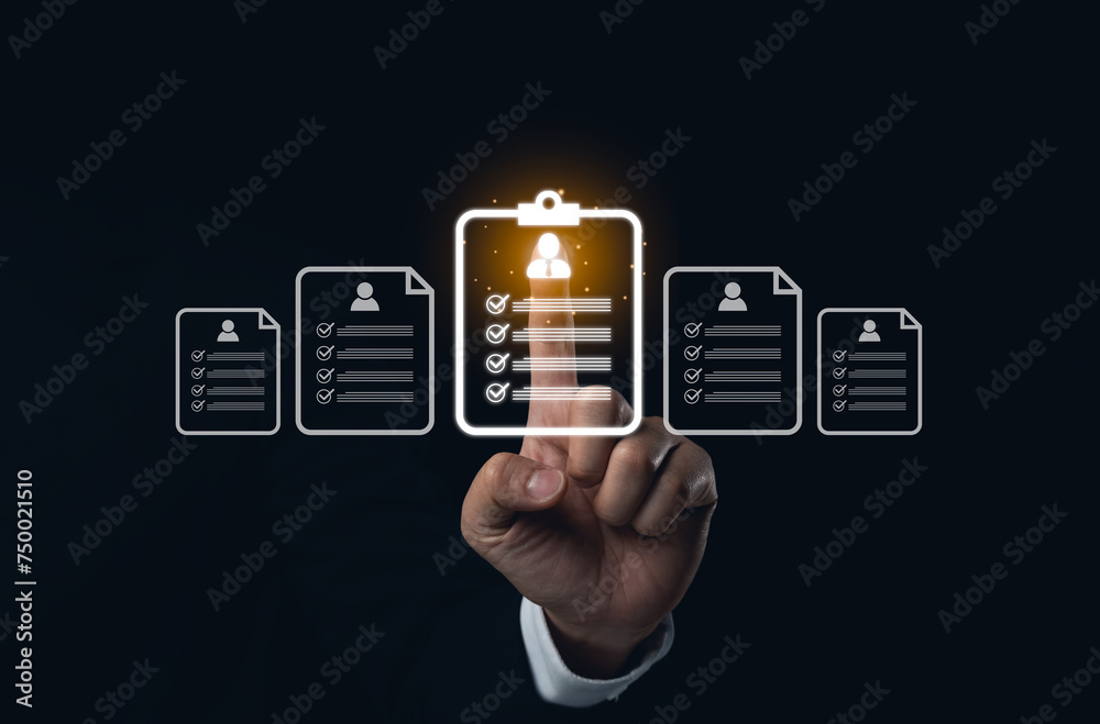 Hand Selecting Glowing HR Document Icons. A hand touching a glowing ...