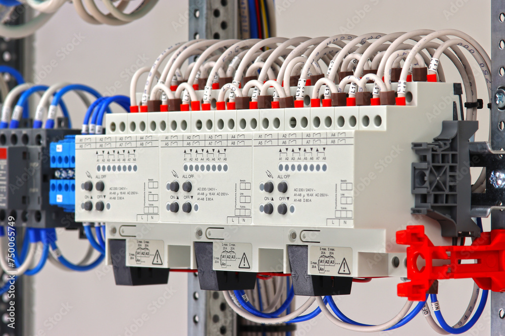 Electronic control modules for apartment automation are installed in an ...