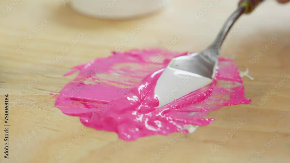 Artist mixing paints for making new artwork. Female artist preparing ...