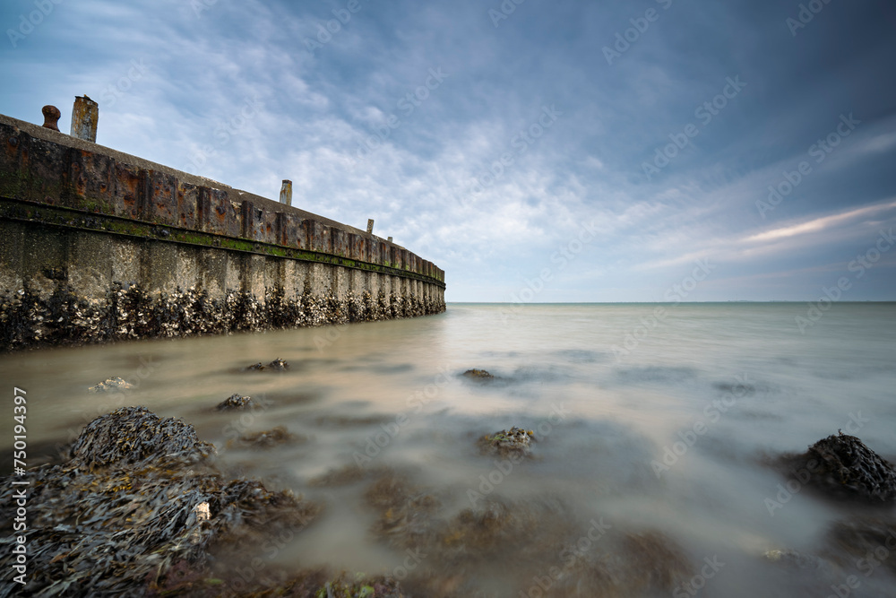 Old mooring quay in a round shape of concrete with mystical long ...