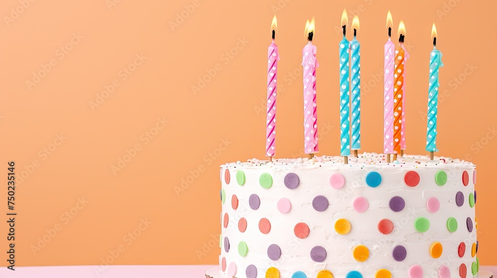 Eye-catching multicolored dotted fondant cake sporting geometrically ...