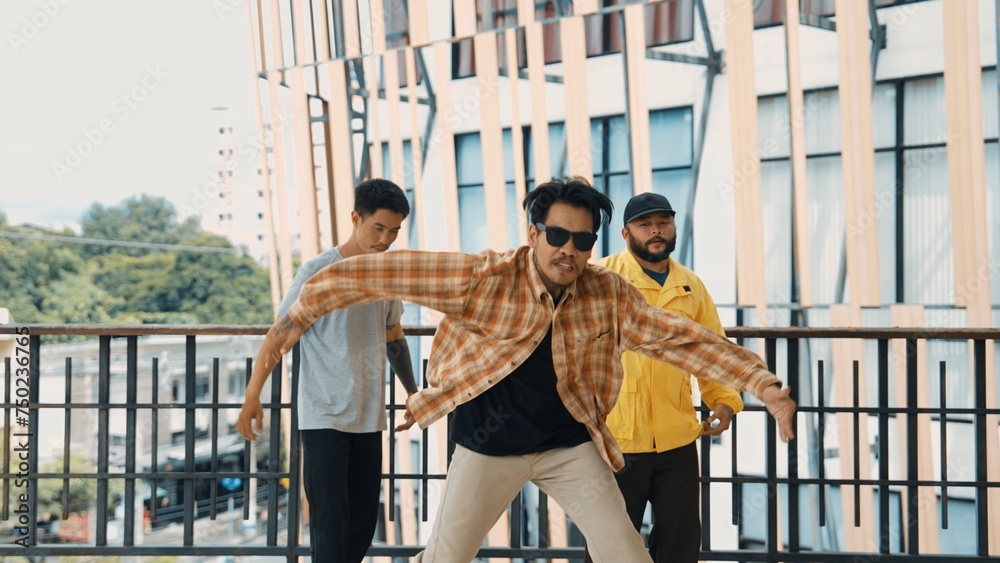 Hip hop team dance break dance while multicultural friend surrounded ...