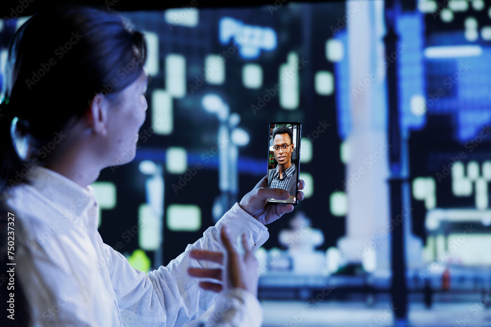 Asian man in videocall with step brother while walking around city ...