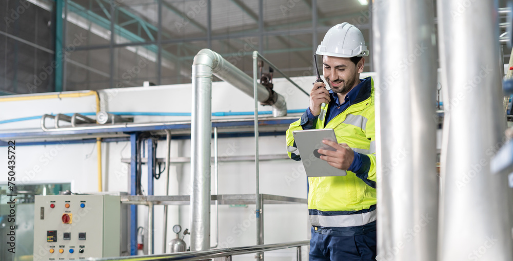 Mechanic or maintenance or electrical engineer checking main electrical ...