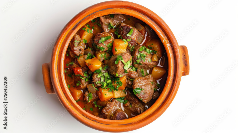 Lamb Tagine in a clay pot, top-down view isolated on white background ...