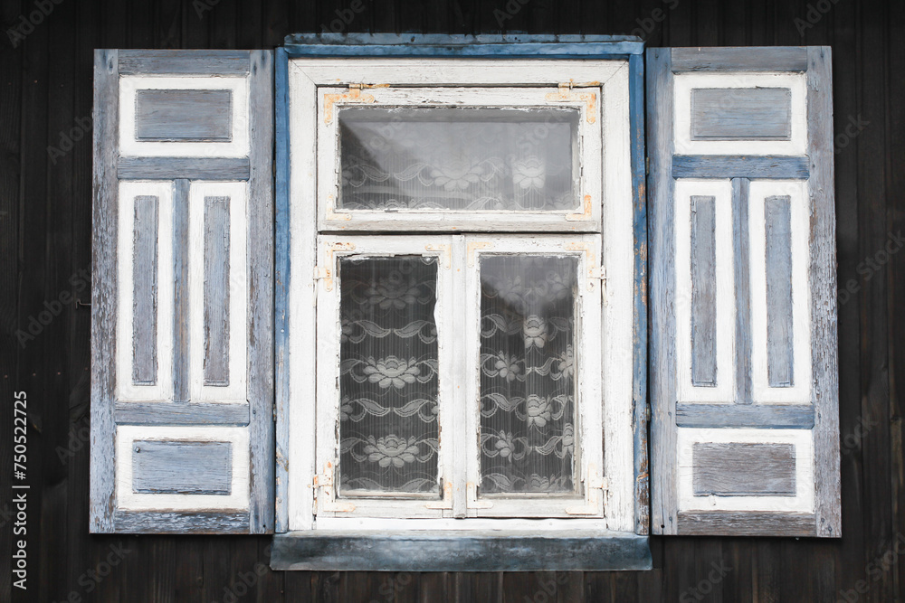 Wooden rustic window in cottage house. Abandoned forsaken wooden home ...