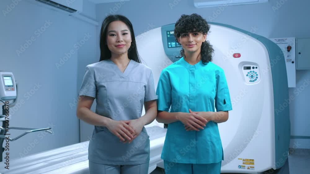 Neuroscientist doctors in blue uniform medical workers looking at ...