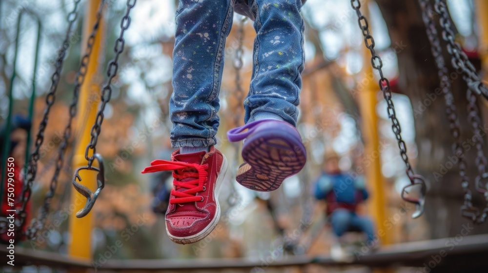 A playful photo of a child in a park, jumping off a swing, with one red ...