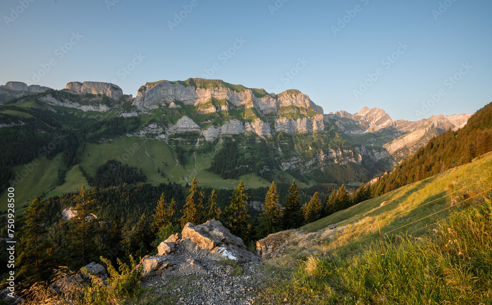 Beautiful early morning summer view with warm light on Marwees mountain ...