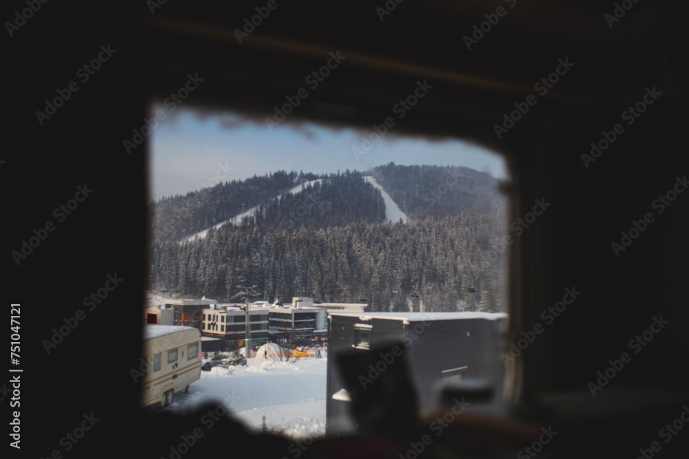 Ski resort in camper window. House on wheels. Stock Photo | Adobe Stock
