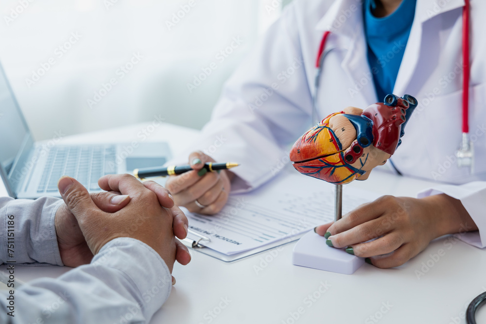 Heart disease. Female doctor gives advice on heart disease treatment. A ...