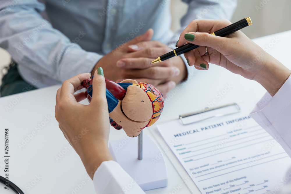 Heart disease. Female doctor gives advice on heart disease treatment. A ...