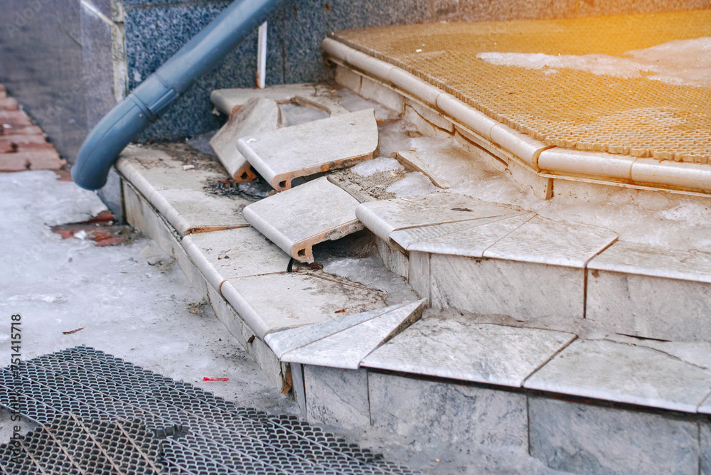 Poor construction of concrete steps on the porch. Damaged concrete ...