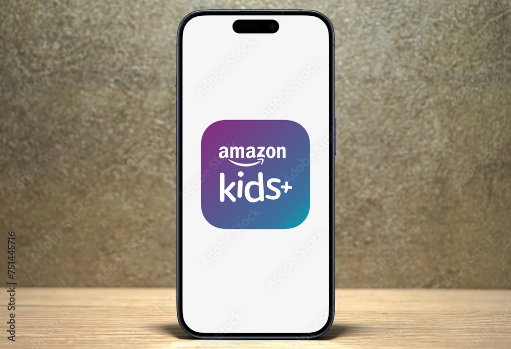 amazon Kids + logo is displayed on a modern smartphone, streaming ...