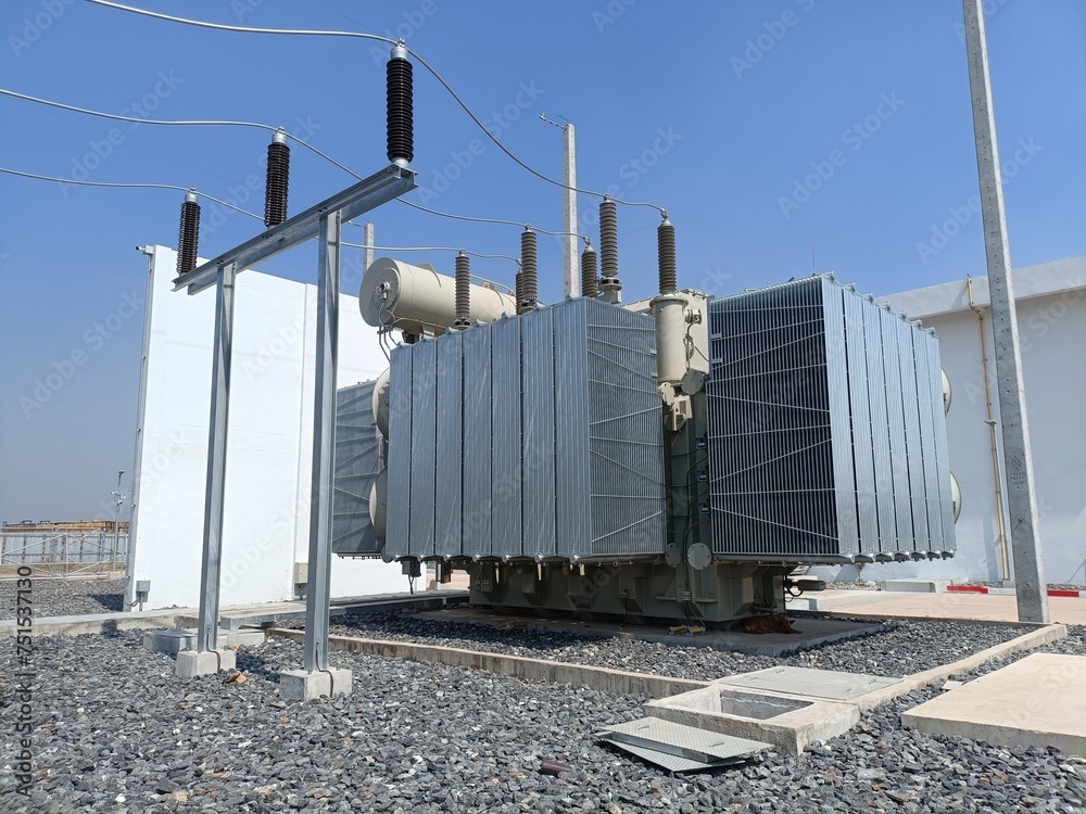 High voltage transformer and fire wall with electrical circuit poles ...
