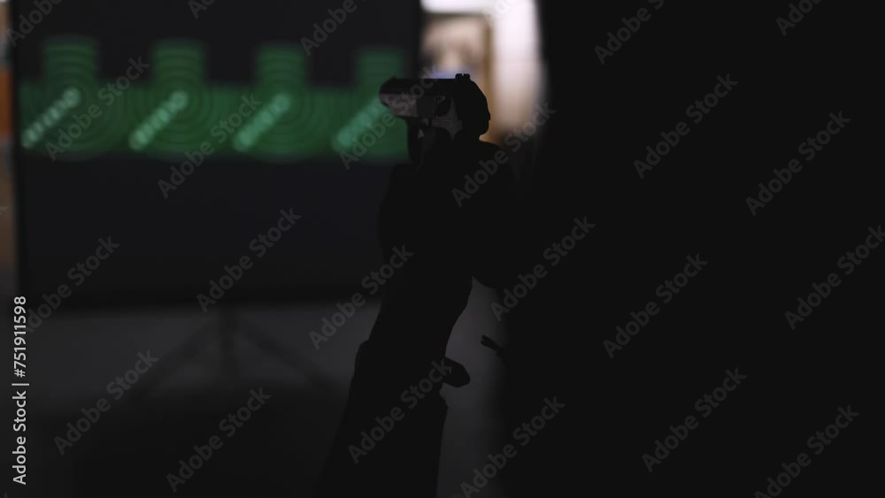 Process of shooting target at the shooting rifle range, women ...