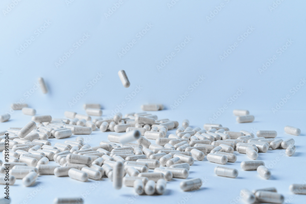 Pharmaceutical clear capsules filled with white probiotics powder ...