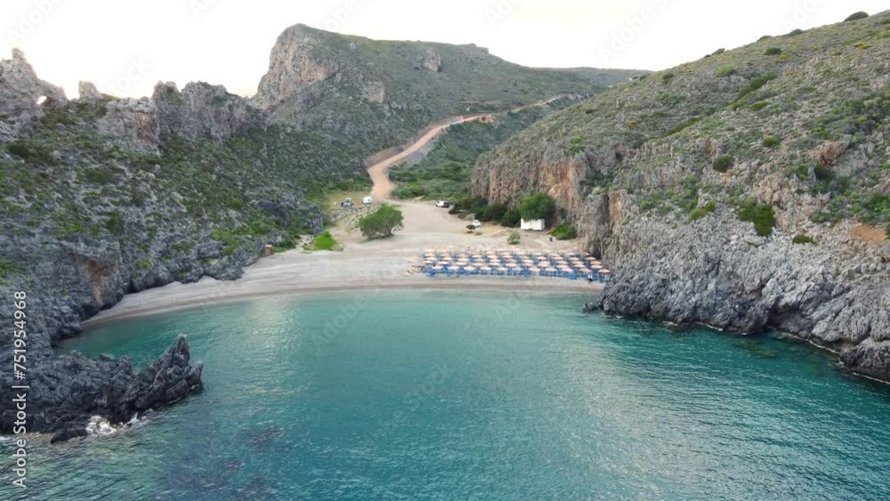 Chalkos Beach in Kythera, Greece, boasts sunbeds and sun umbrellas on ...