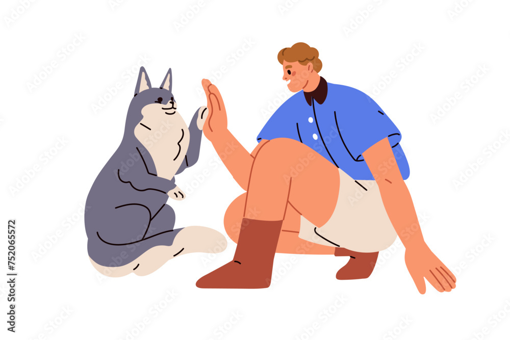 Cute smart cat giving paw, high five to owners hand. Feline animal ...