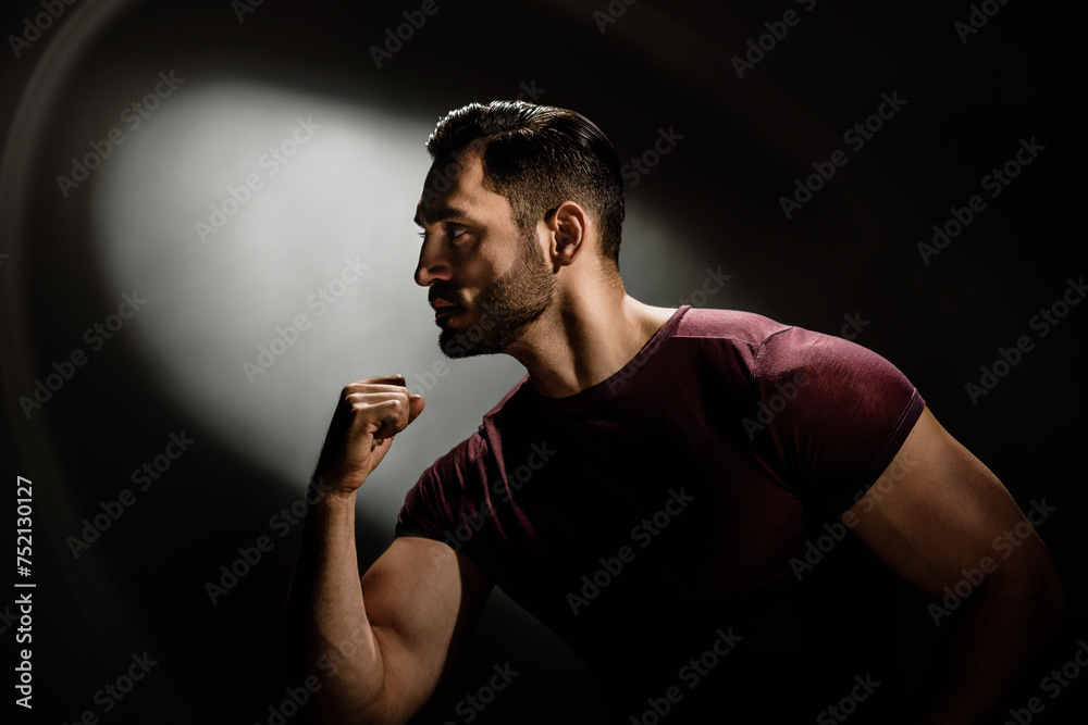 Portrait of minded confident young guy with dark hair and brutal face ...