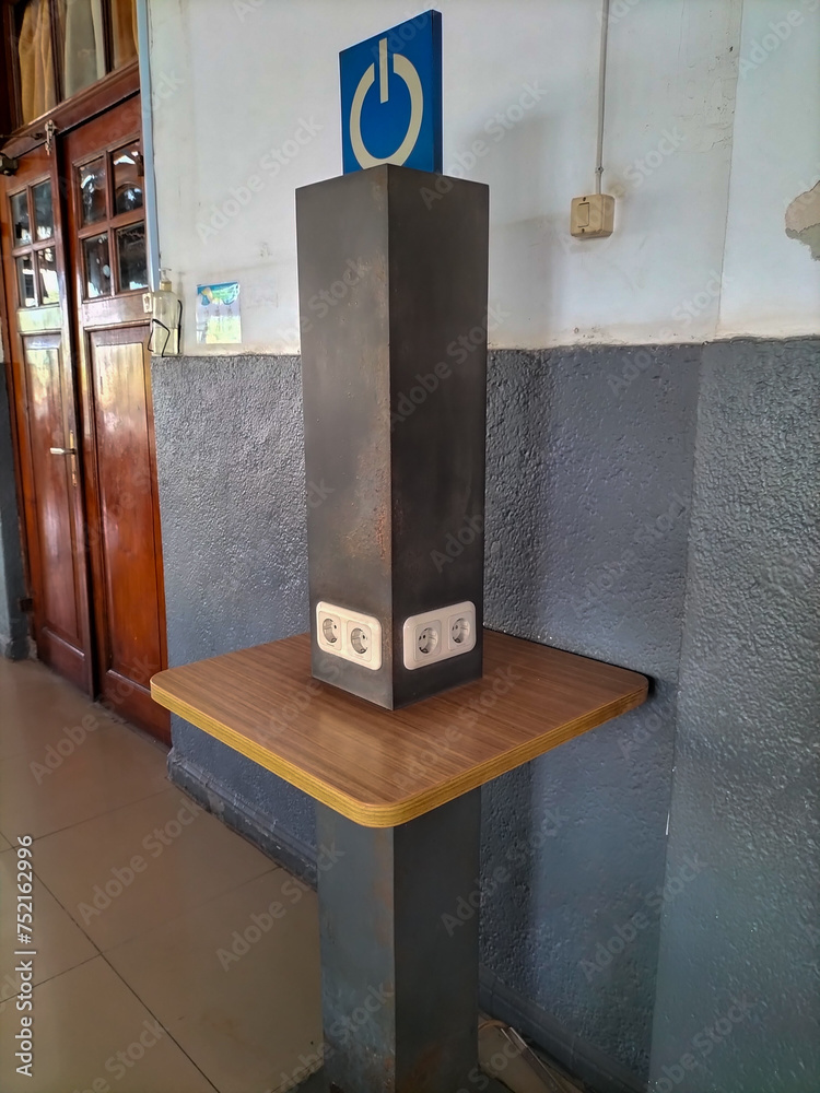 Selective focus. Electric plugs in public areas provided by the manager ...