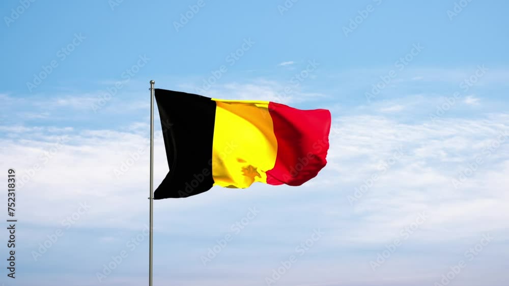 Flag Belgium against cloudy sky. Belgian flag waving in the wind ...