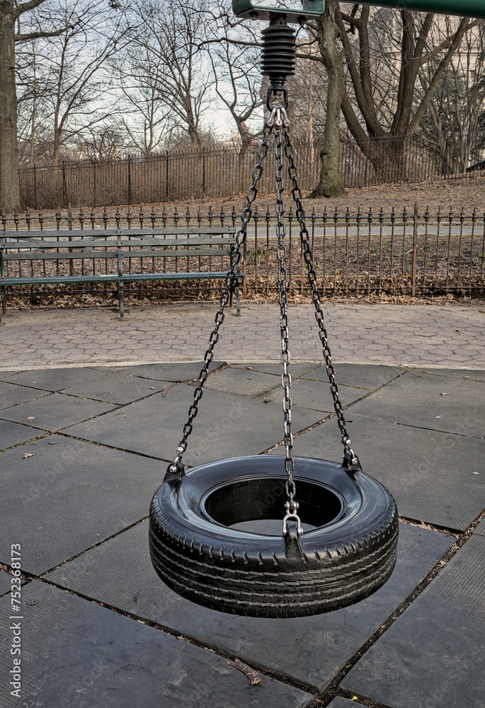 tire swing on metal chains in a public park (mount prospect park ...