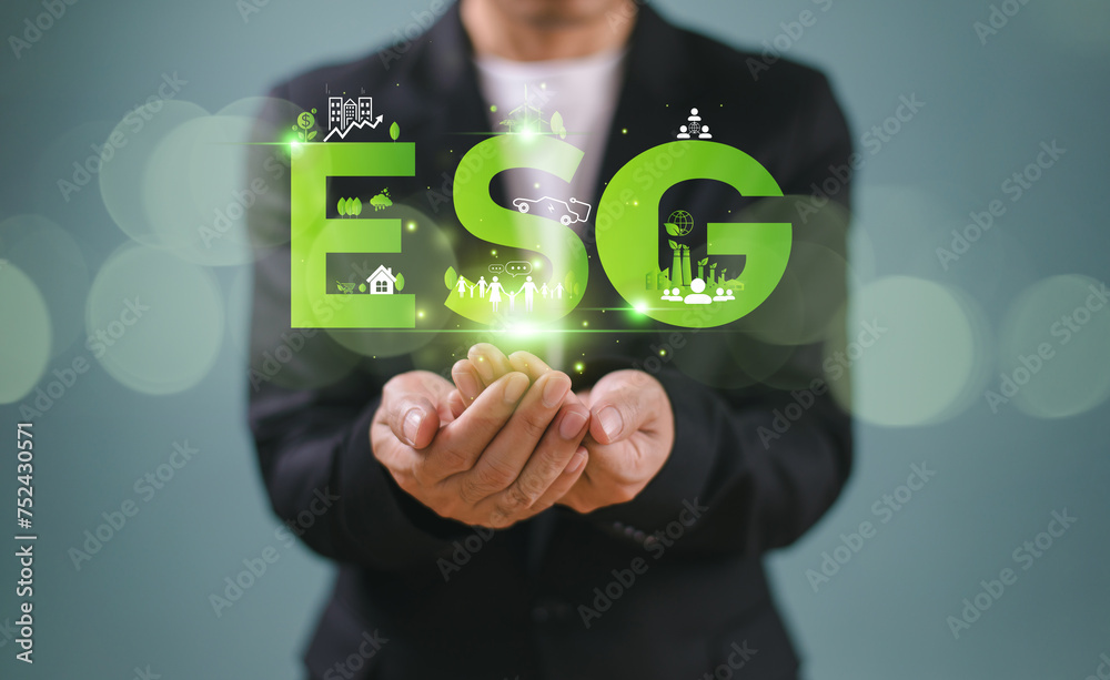 ESG environment social governance concept. Man use computer analyze ESG ...