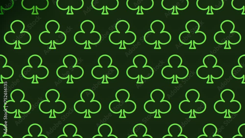 A mesmerizing pattern of playing cards with neon green lights on a ...