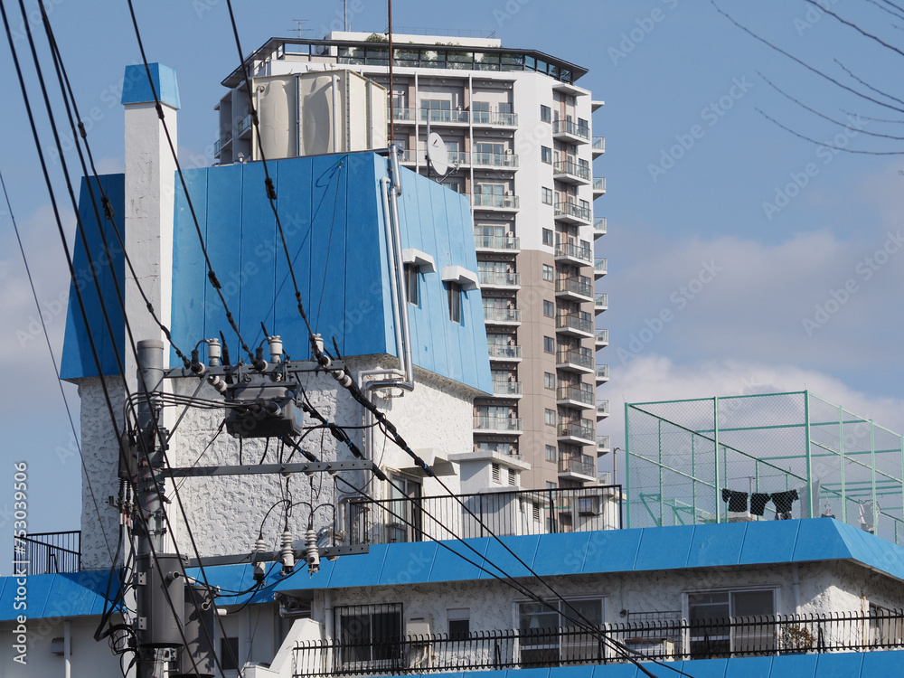TOKYO, JAPAN - March 7, 2024: Utility pole and power lines in Tokyo's ...