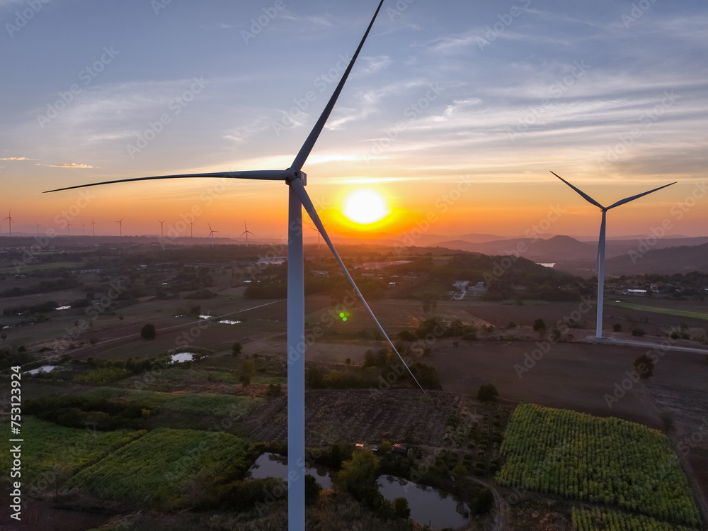 Wind farm field and sunset sky. Wind power. Sustainable, renewable ...