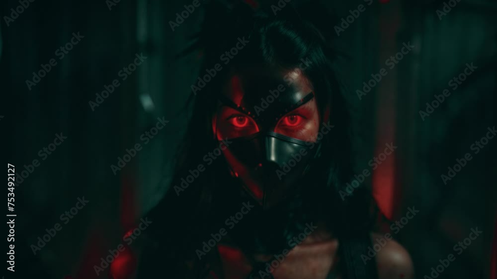 Enigmatic VJ loop animation featuring a woman with striking red eyes ...