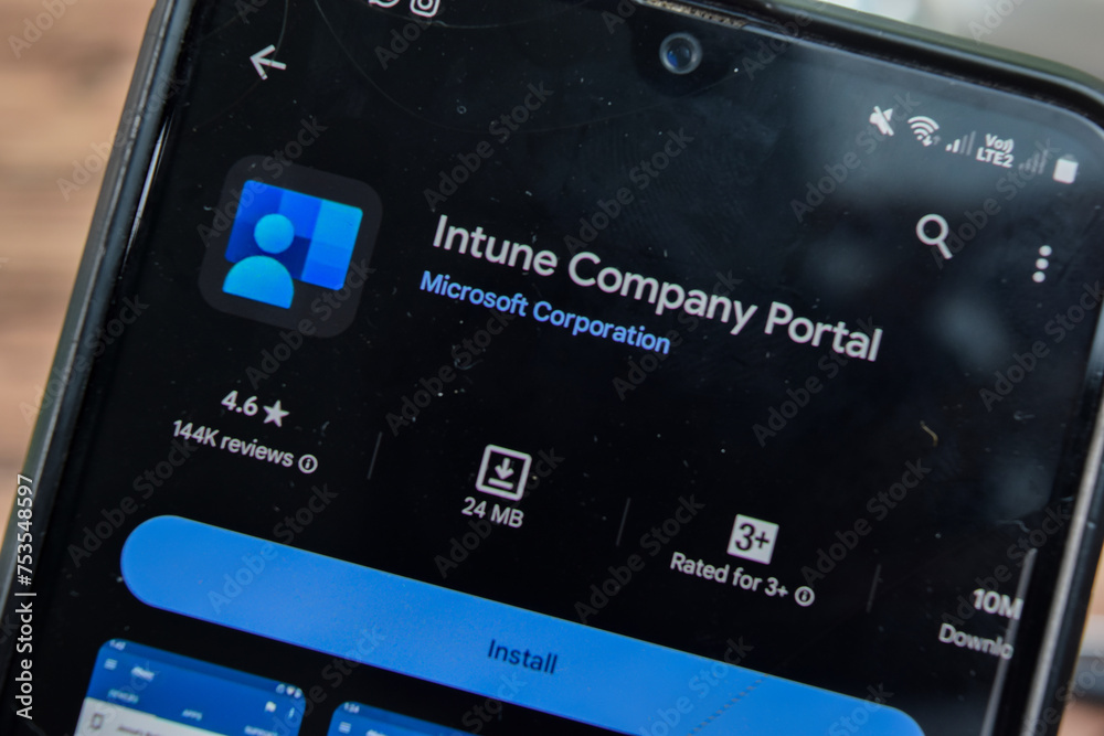 Intune Company Portal application on Smartphone screen. Intune is a ... Intune Company Portal application on Smartphone screen. Intune is a ...
