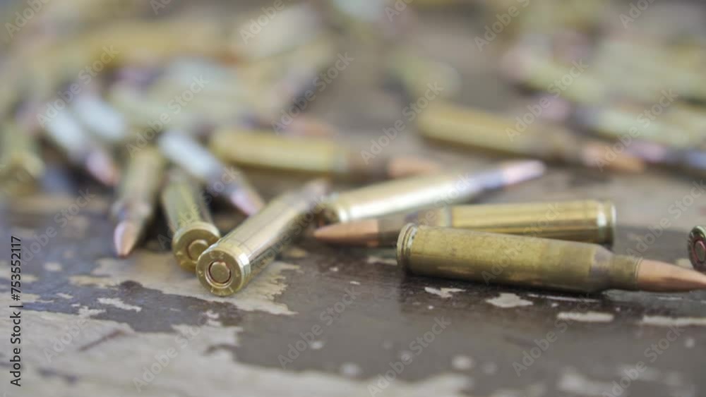 Gun Bullets on the ground, Passing Rows Of M-16 Gun Ammunition ...