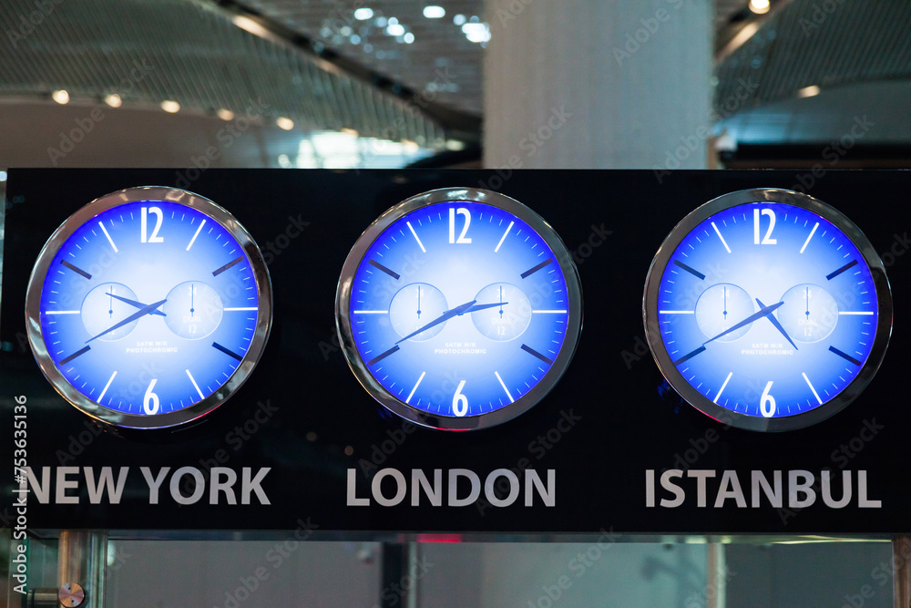 Clocks in the airport building showing world time in different time ...