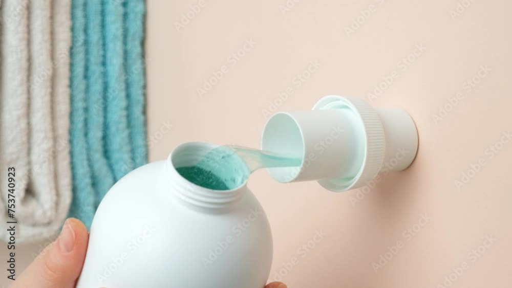 The process of pouring natural eco gel liquid laundry detergent from ...