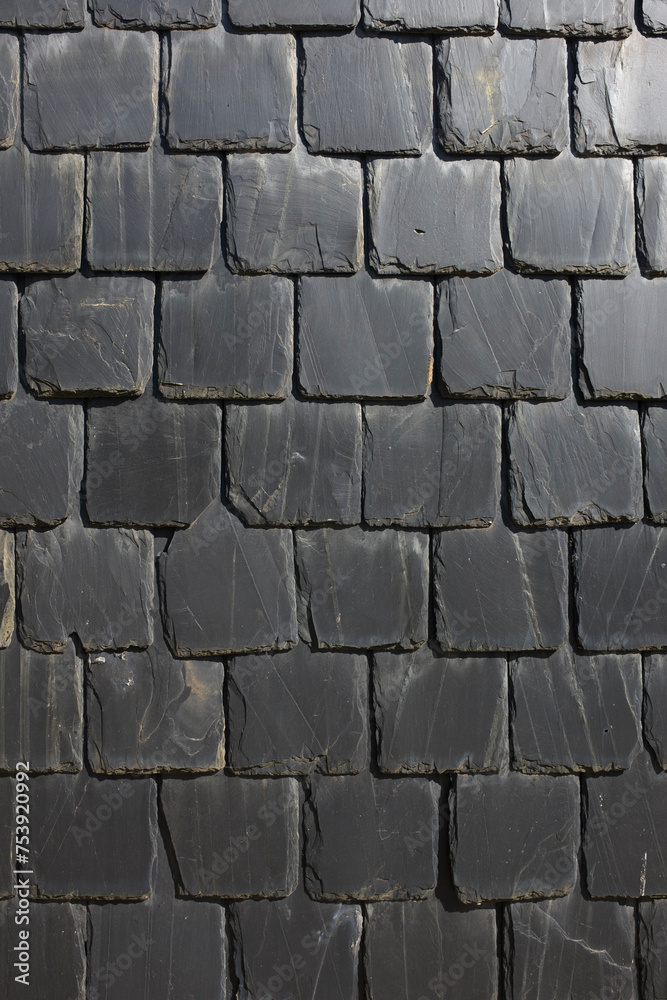 Black stone brick wall with lively light and pretty shadows Stock Photo ...