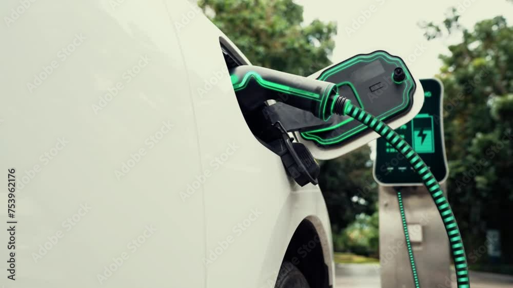 Electric car recharging battery by futuristic smart EV charger from eco ...