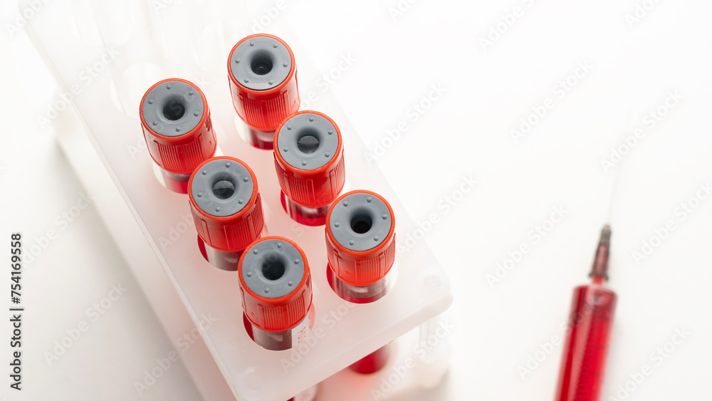 Stack of test tubes and syringe. Doping Test, Tubes with athlete's ...