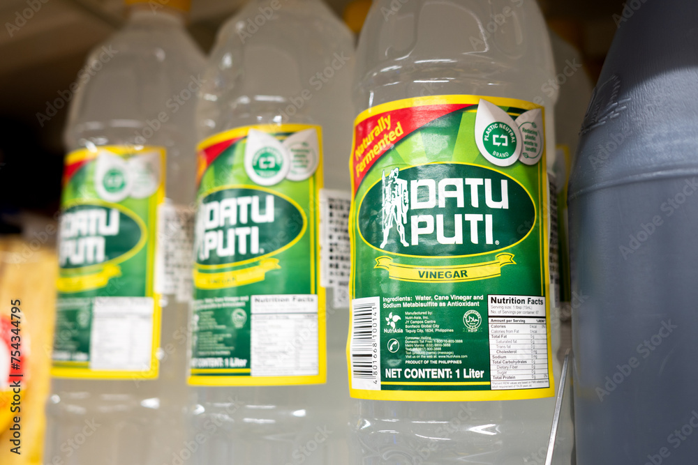 Datu Puti vinegar 1 liter container on a supermarket shelf - product of ...