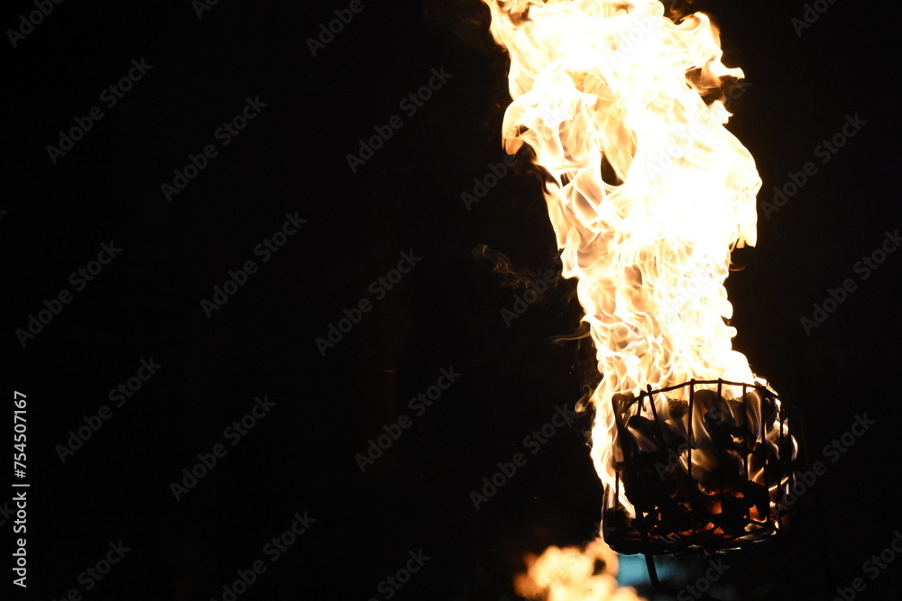 Flames of a coppara torch that lighting in Kandy Esala Perahera at ...
