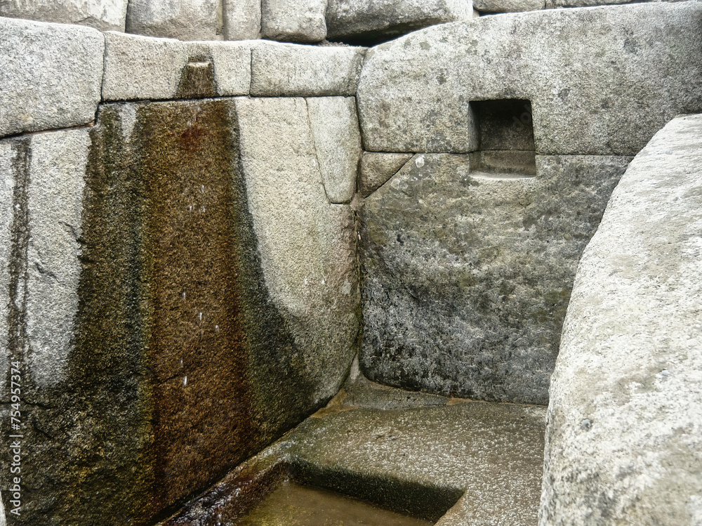 Details of stone houses in the famous archaeological site of Machu ...