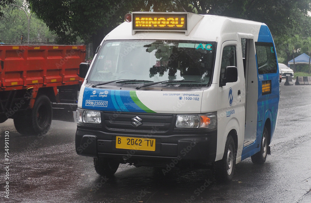 Jak Lingko public tansportation (angkot) with Suzuki Carry car. Jak 47 ...