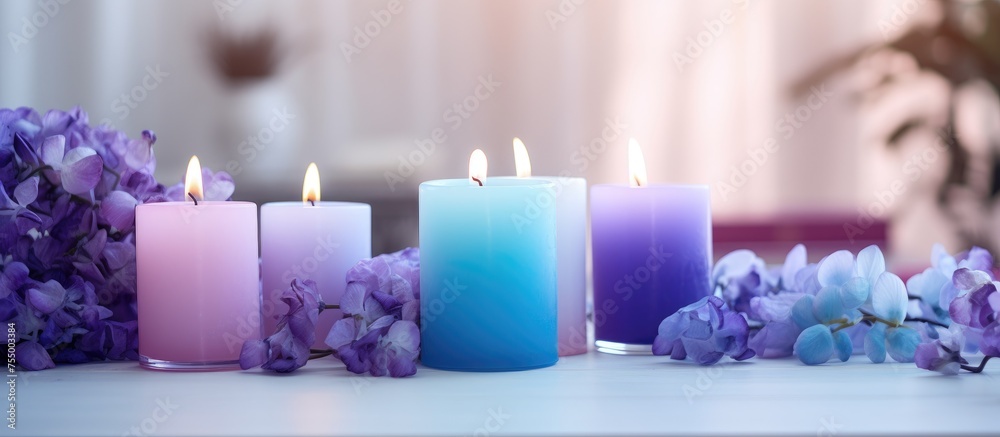The image shows a white table decorated with vibrant purple and blue ...