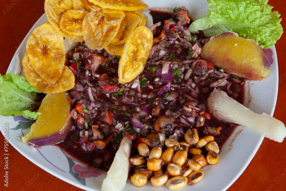 Cebiche de conchas negras, or Peruvian Black Shell Ceviche, is a ...